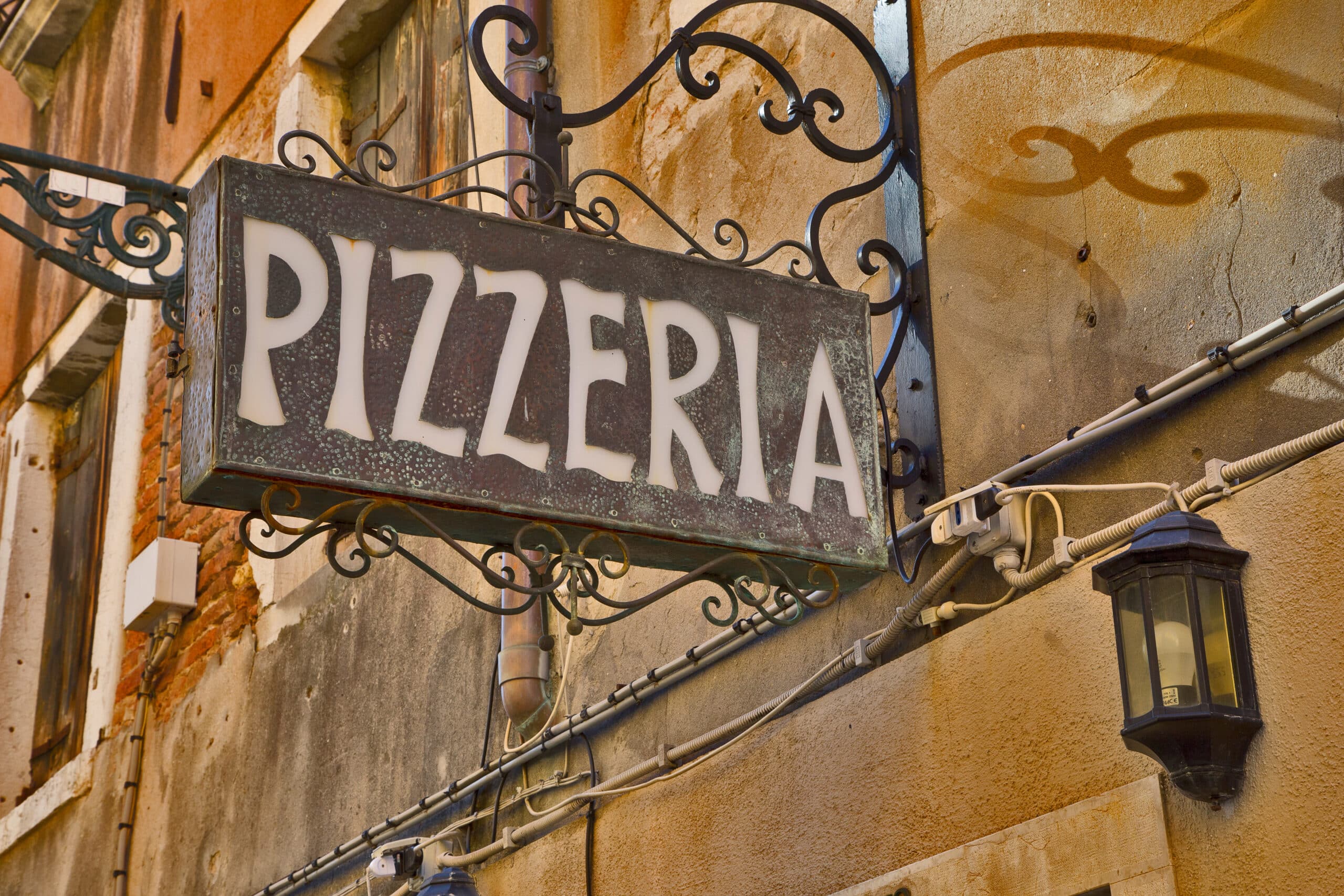 Pizza Shops Are Celebrating Family History - Alley Cat Pizzeria